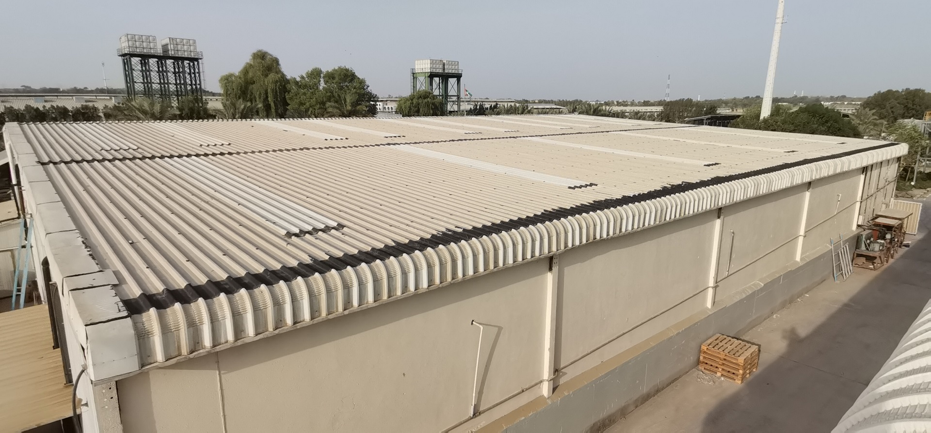 Warehouse Roof Replacement in UAE | Topnotch Steels and Contracting ...